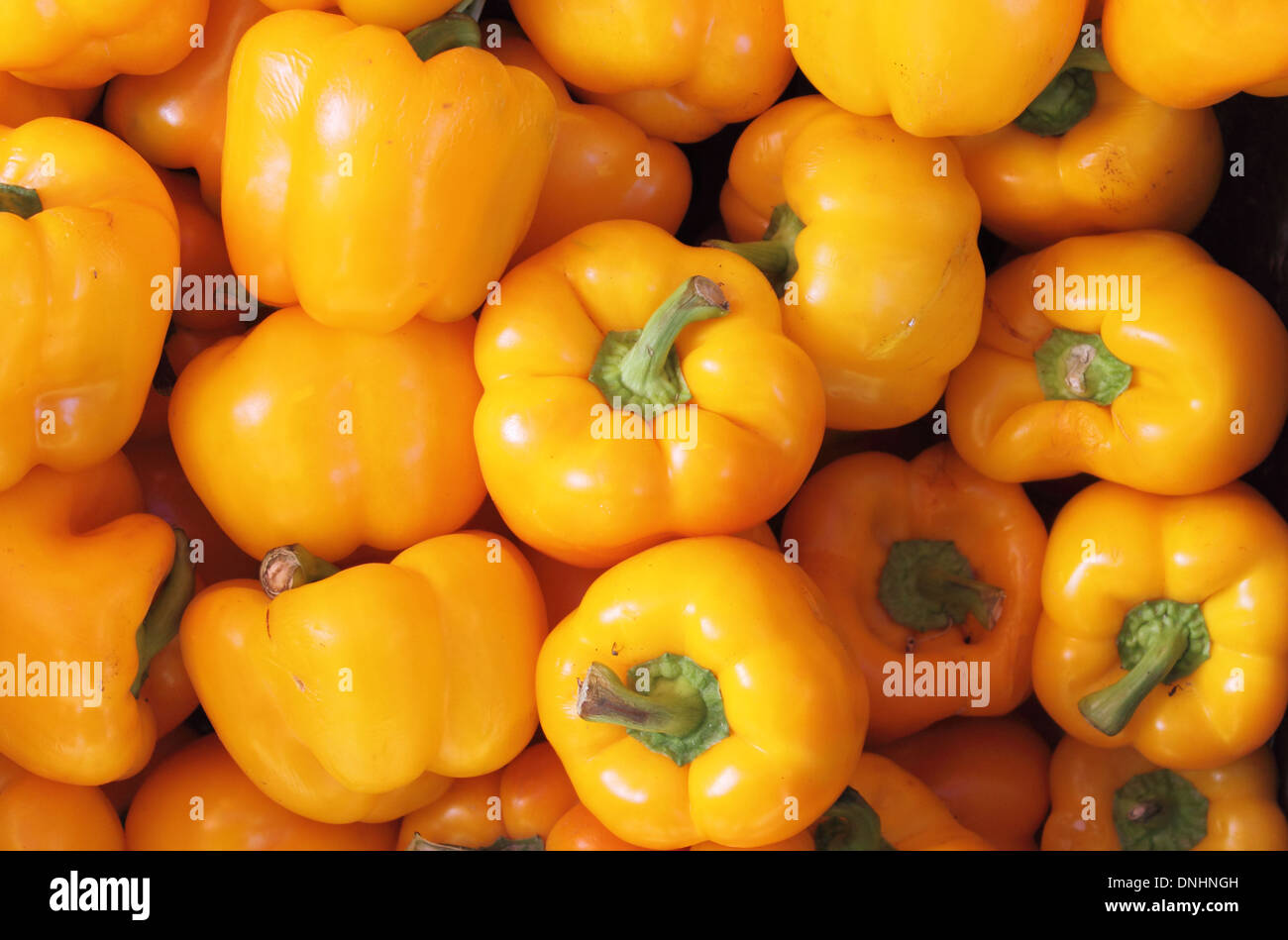 Pile of yellow peppers hi-res stock photography and images - Alamy