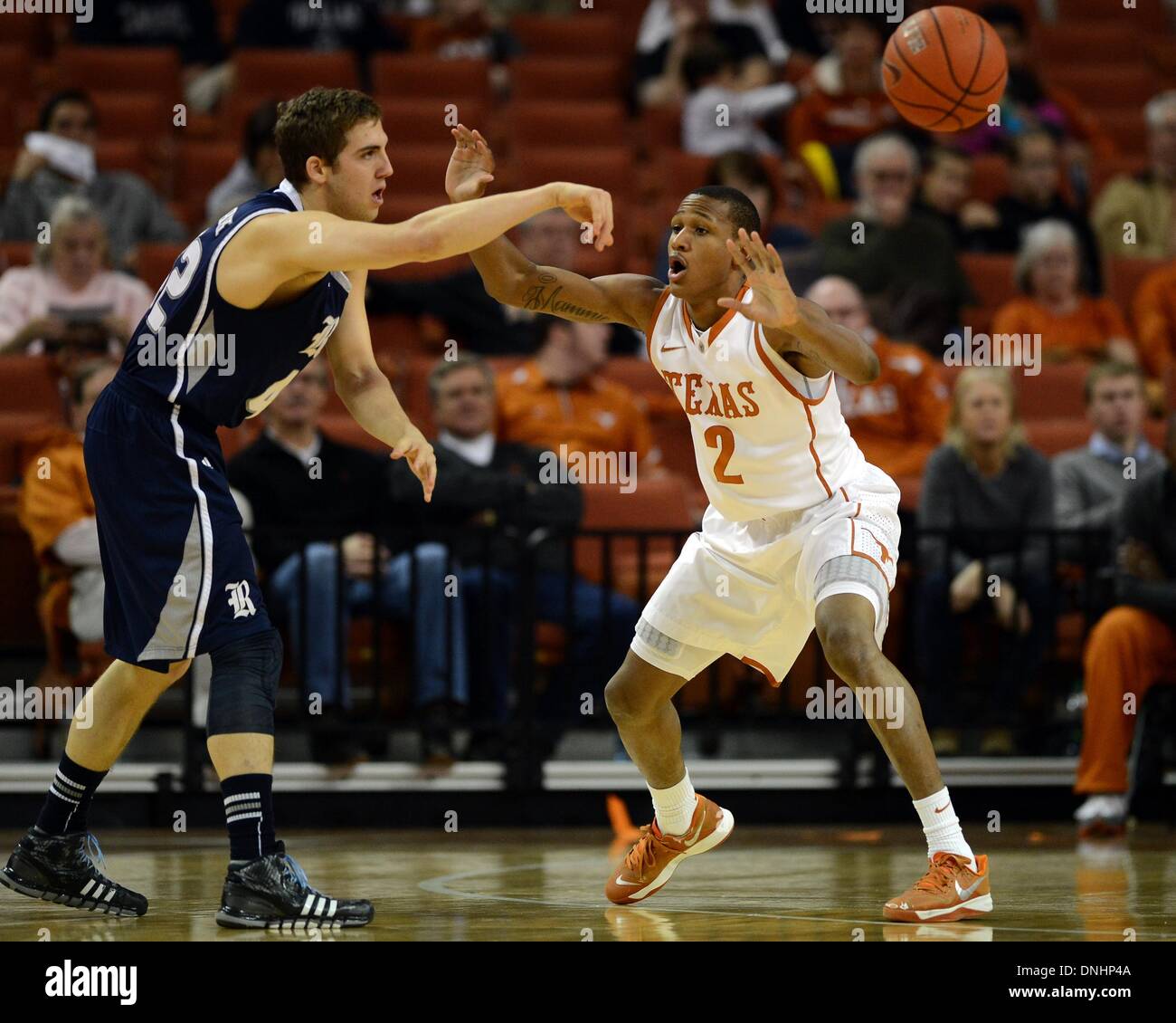 Dec 30, 2013. Demarcus Holland #2 of the Texas Longhorns covers Austin ...