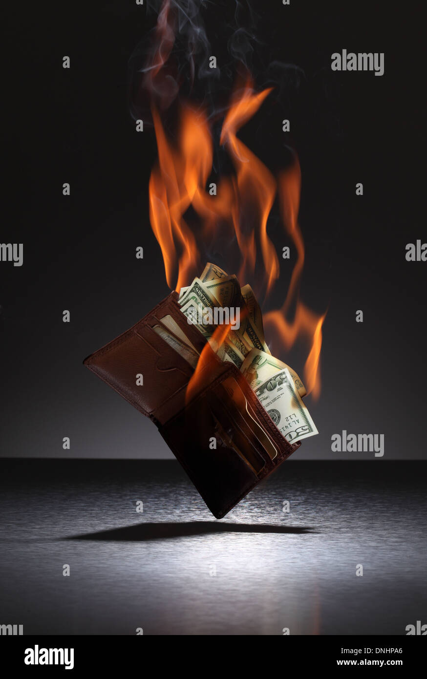 Wallet filled with money hi-res stock photography and images - Alamy