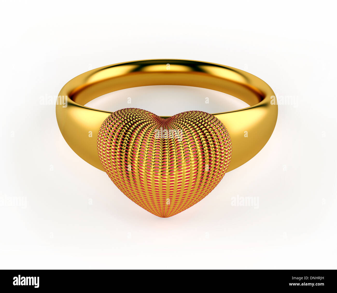 Gold Heart and wedding rings Stock Photo - Alamy