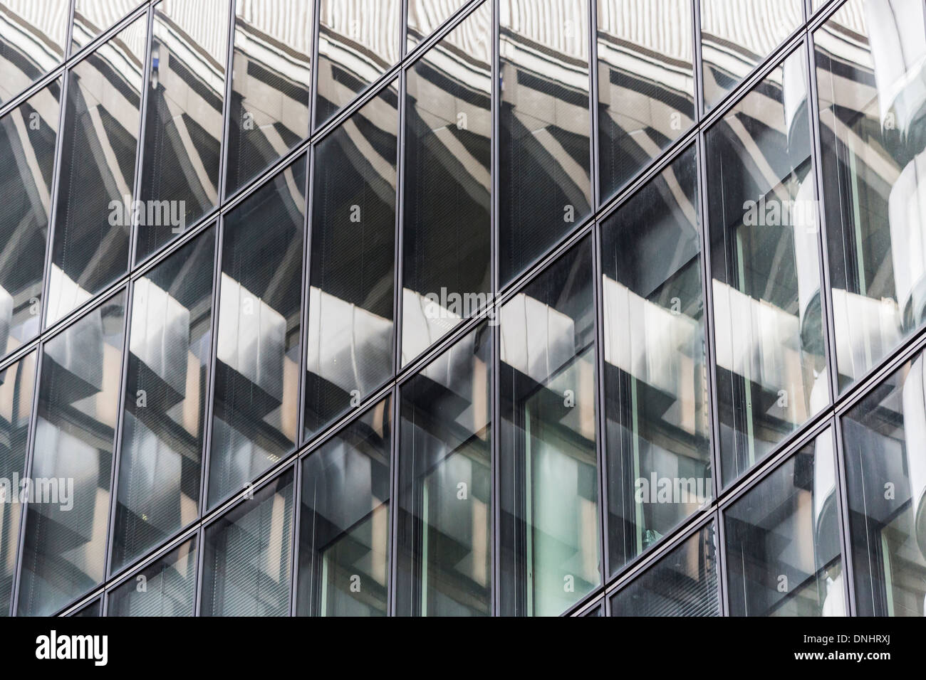 Reflections in the windows of the Gherkin, St Mary Axe, City of London ...