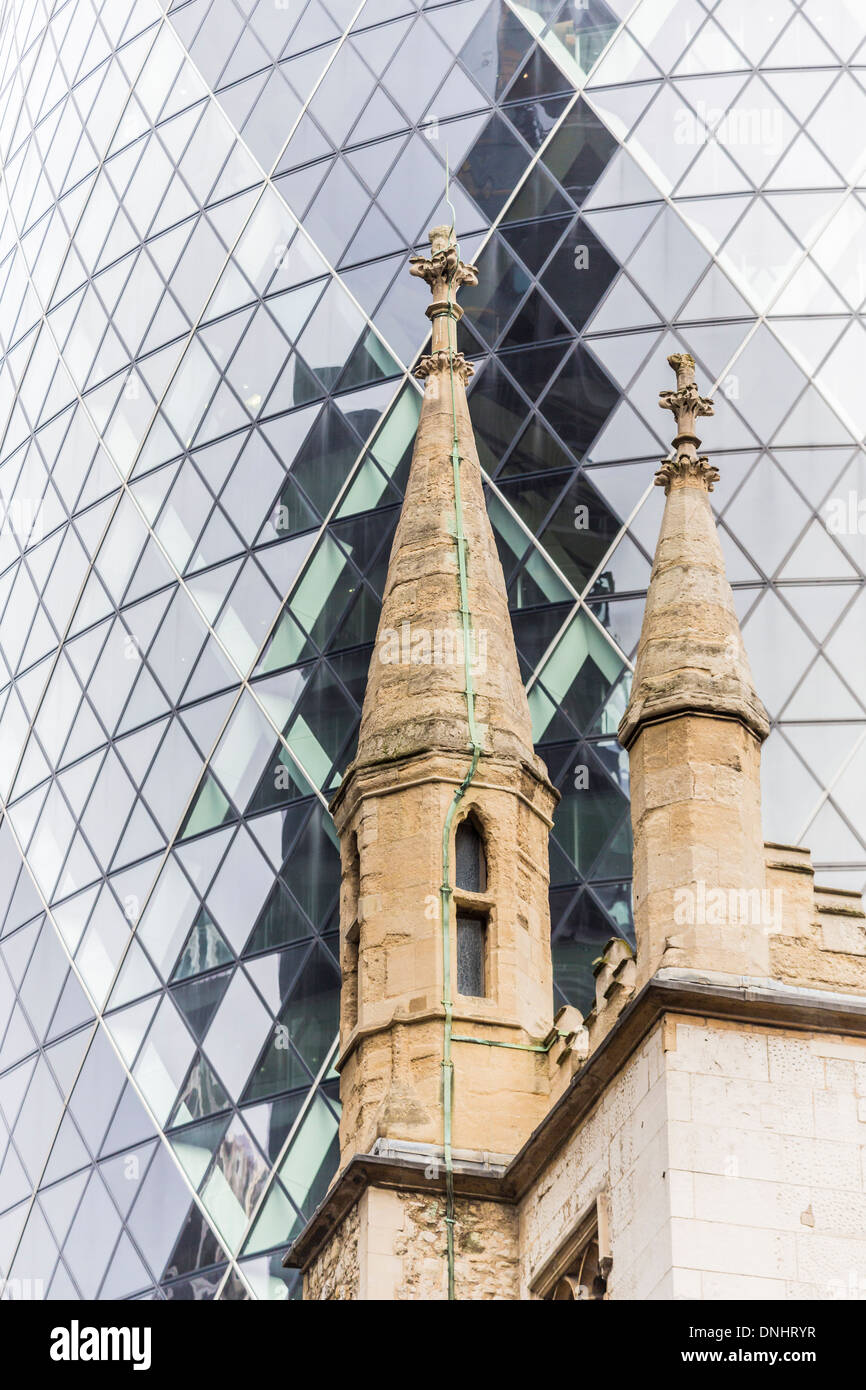 The Gherkin reflecting St Andrew Undershaft church, St Mary Axe and ...