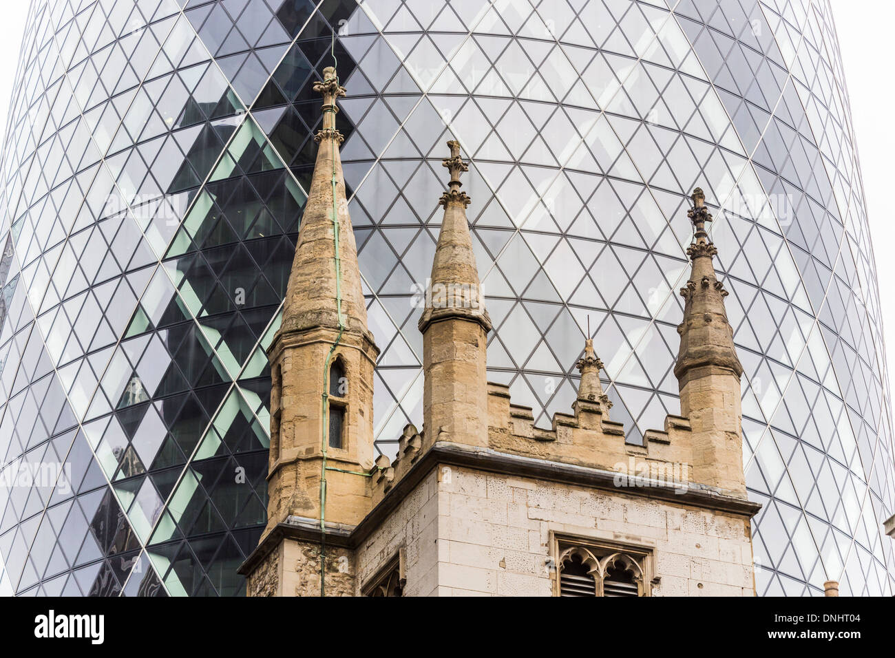 The Gherkin reflecting St Andrew Undershaft church, St Mary Axe and ...
