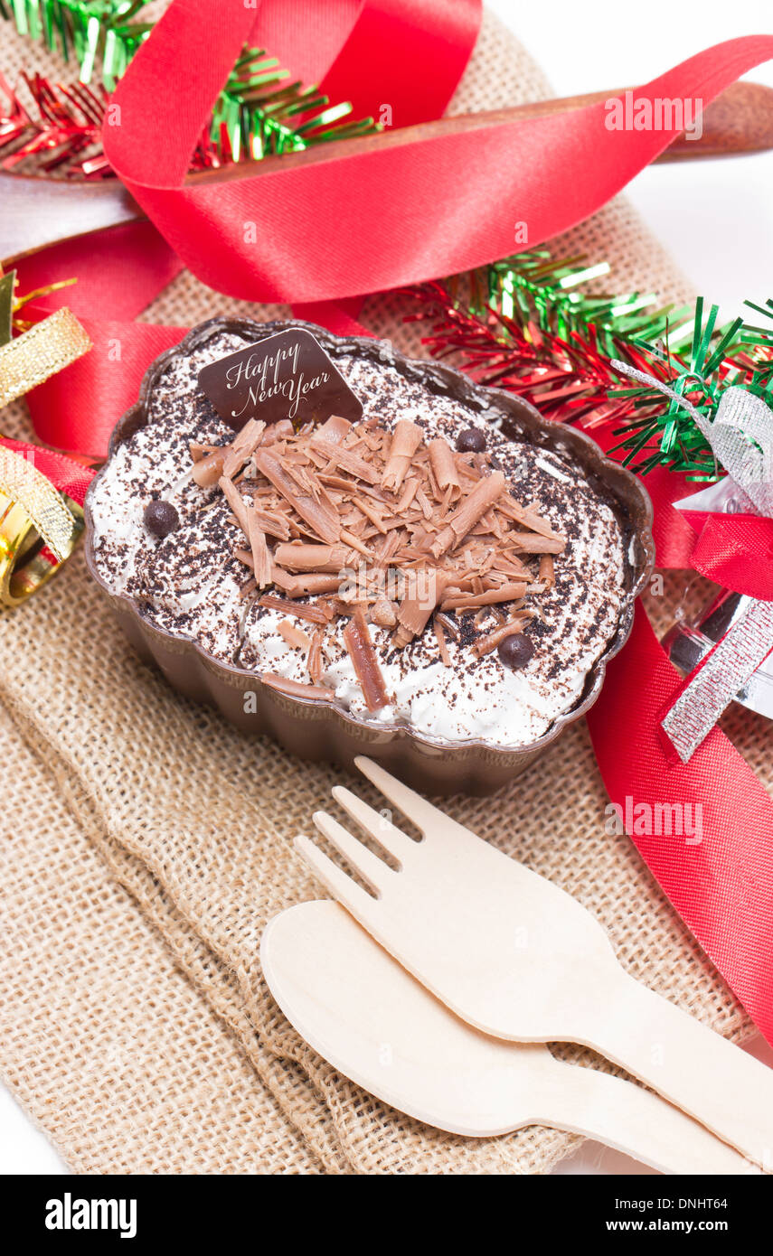 Chocolate moose dessert decorating with accessories Stock Photo - Alamy