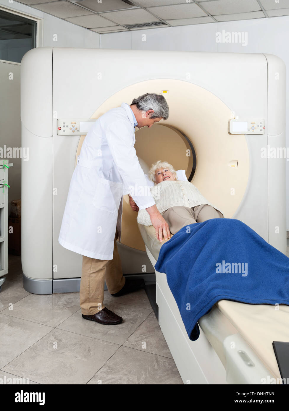 Doctor Preparing Woman For CT Scan Test Stock Photo - Alamy