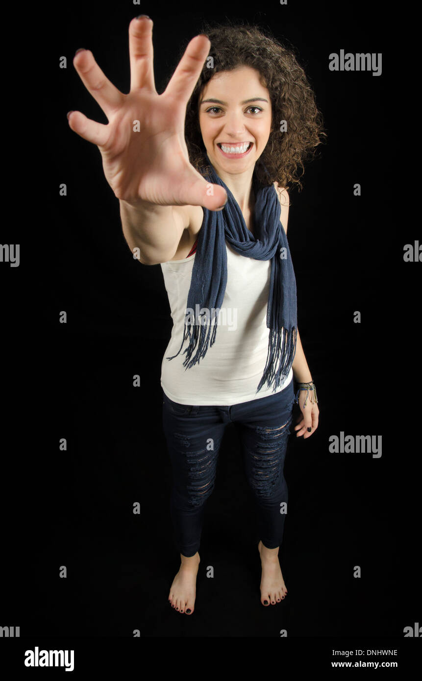 Young Woman in Grabbing Pose Stock Photo - Alamy