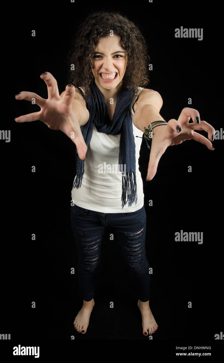 Aggressive Young Woman With Hands In Grabbing Position Stock Photo - Alamy