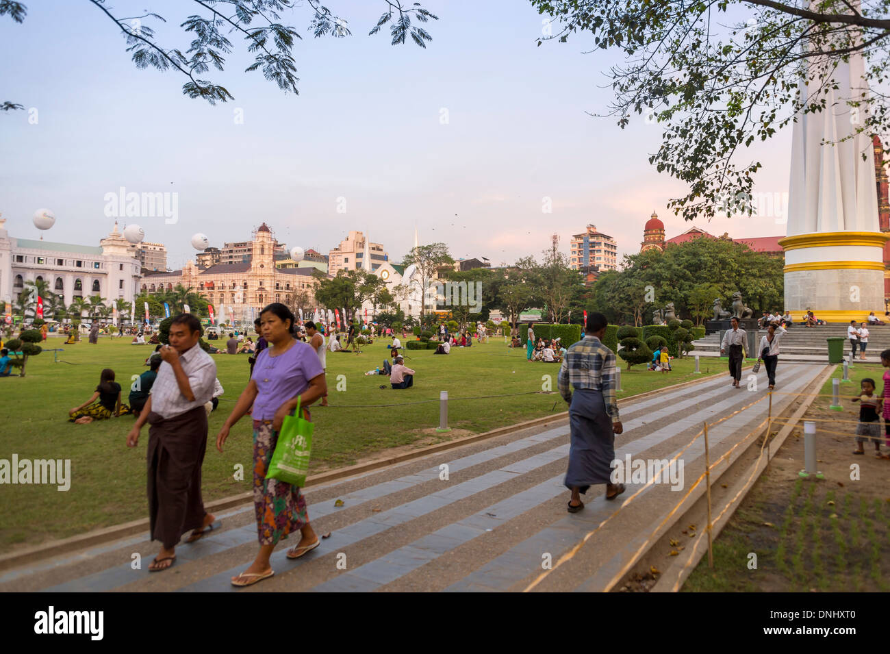 YANGON, MYANMAR - CIRCA DECEMBER 2013: People walking in the Maha ...