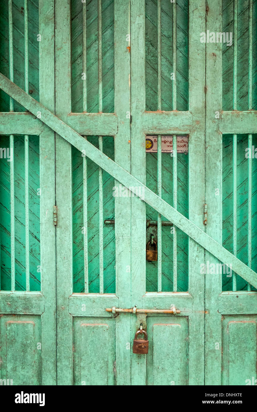 YANGON, MYANMAR - CIRCA DECEMBER 2013: View of a typical door in the ...