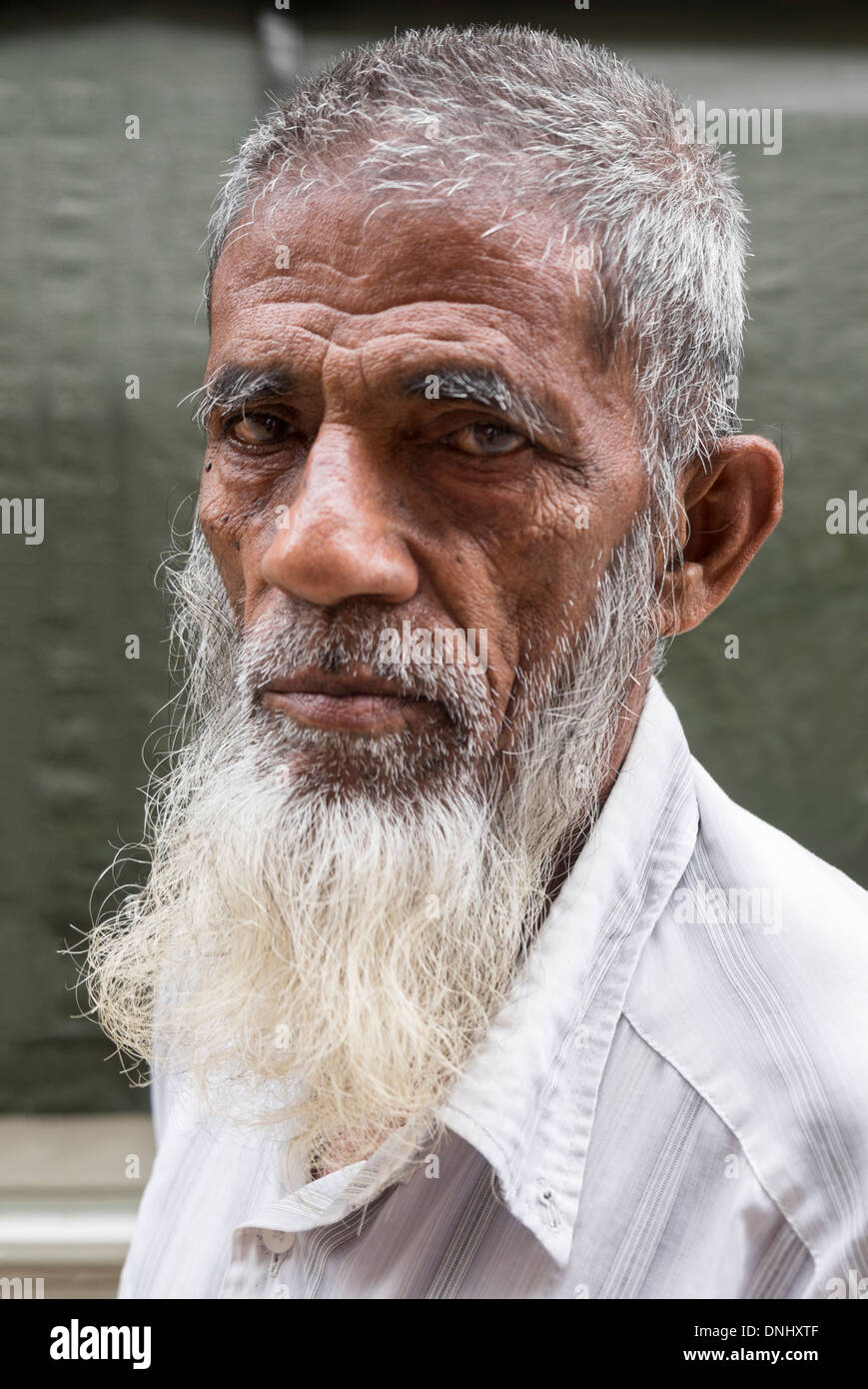 YANGON, MYANMAR - CIRCA DECEMBER 2013: Portrait of an old man in the ...