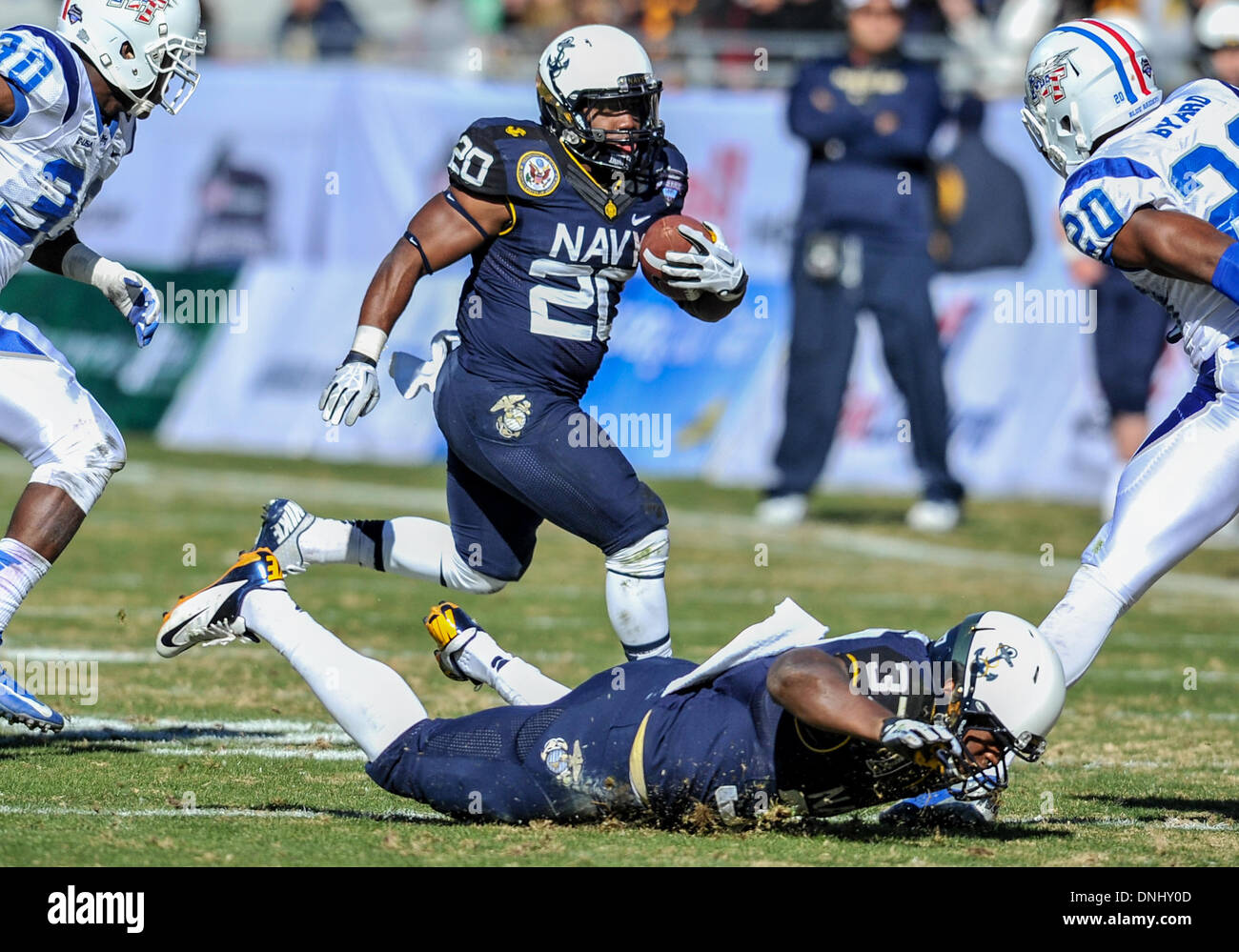 Fort Worth, Texas, USA. December 30th, 2013: .Navy Midshipmen running ...