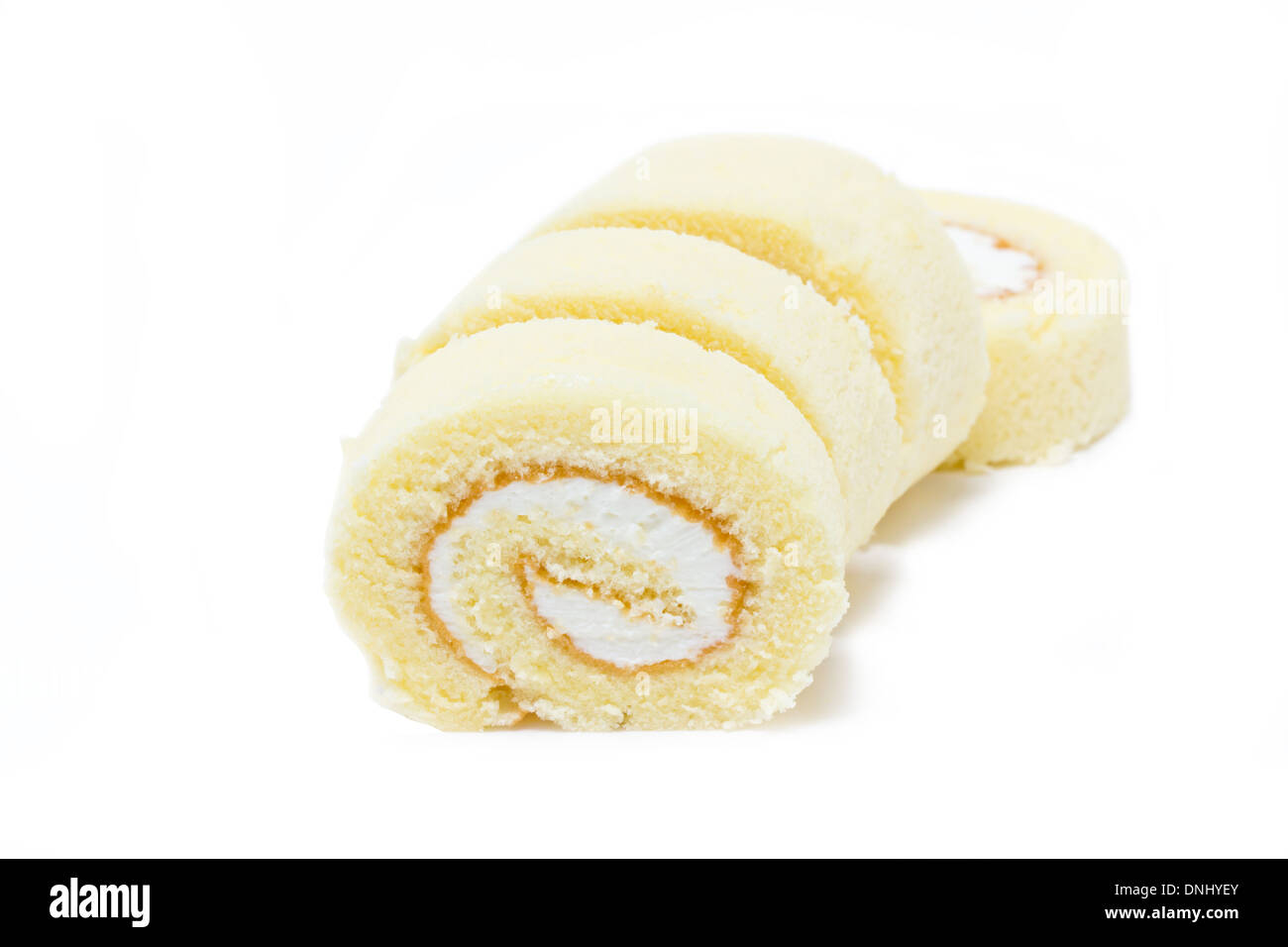 Vanilla roll cake isolated on white Stock Photo - Alamy
