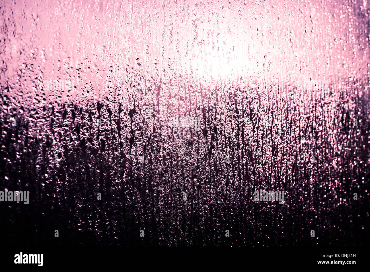 Moisty wet window with water running down the surface Stock Photo - Alamy