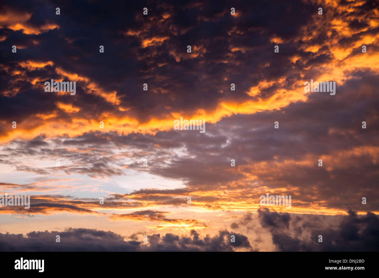 Dramatic sky with dark heavy clouds at sunset Stock Photo - Alamy