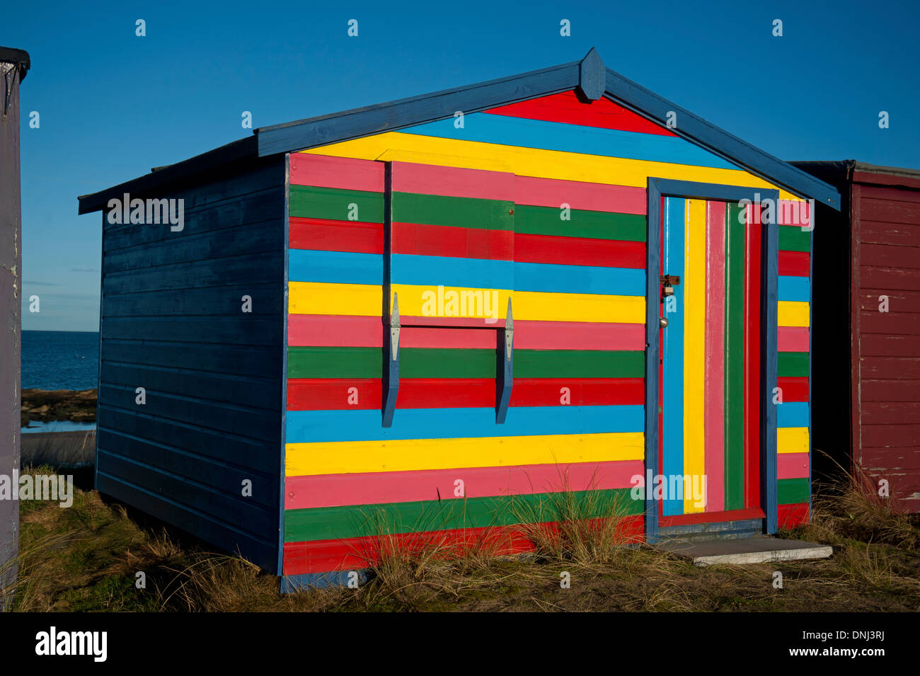 Colourful beach hut at the East Beach Hopeman, Moray Firth. Grampian ...