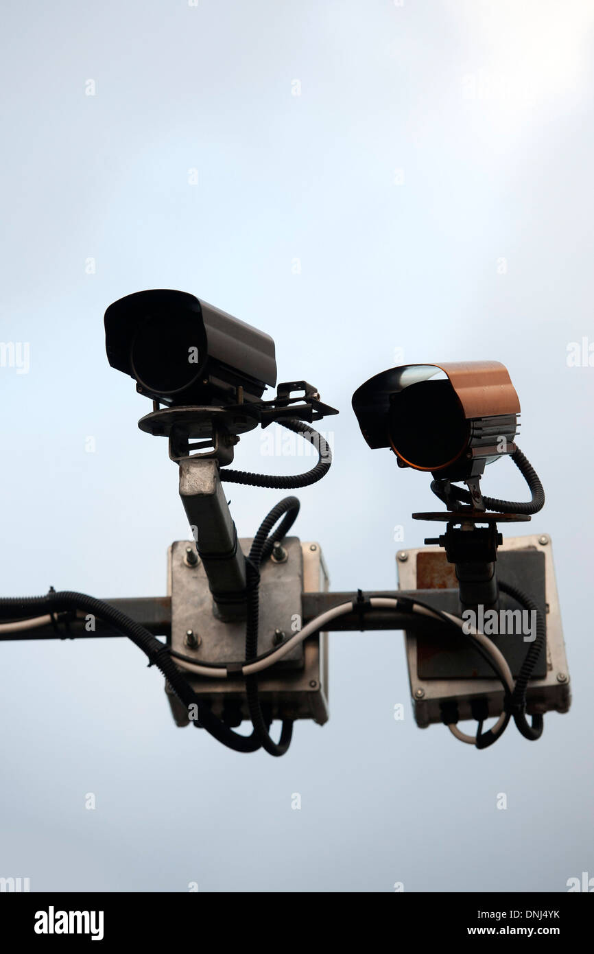 Two cctv security cameras Stock Photo - Alamy
