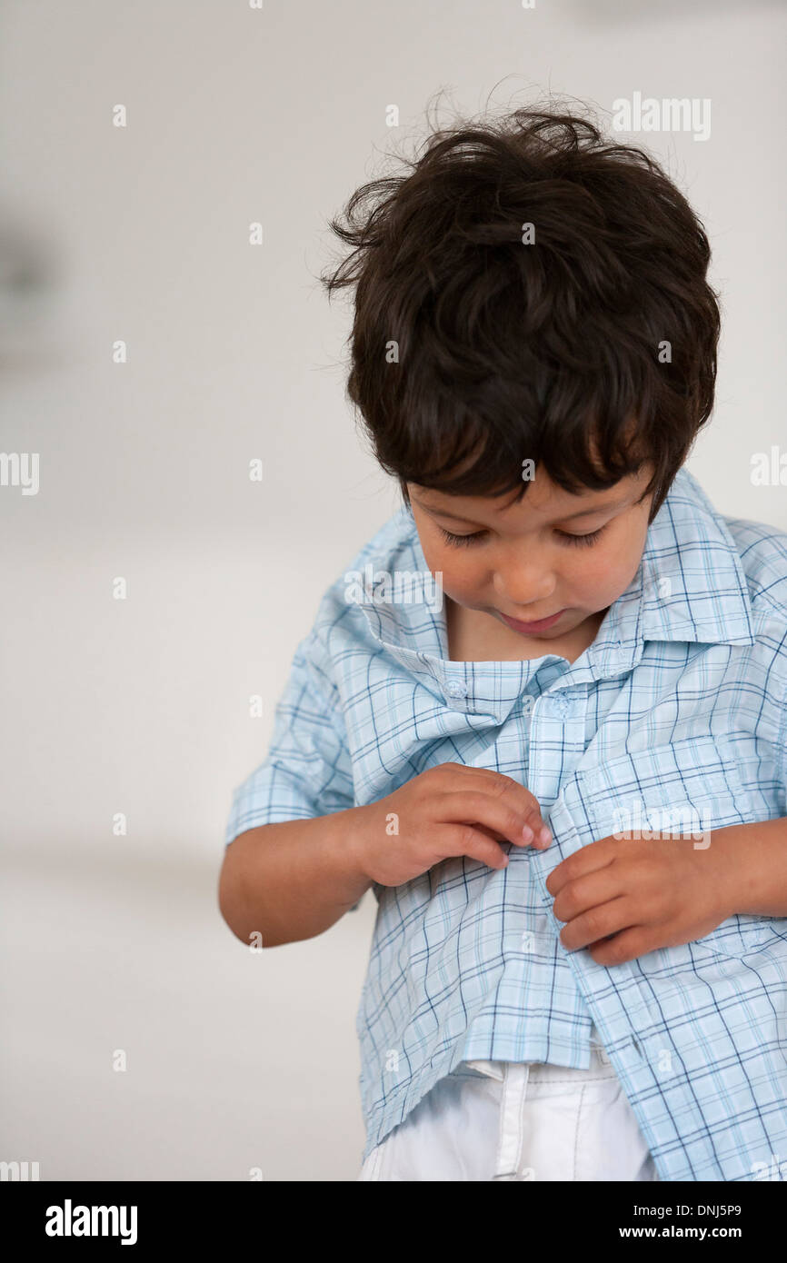 Boy 3 buttons hi-res stock photography and images - Alamy