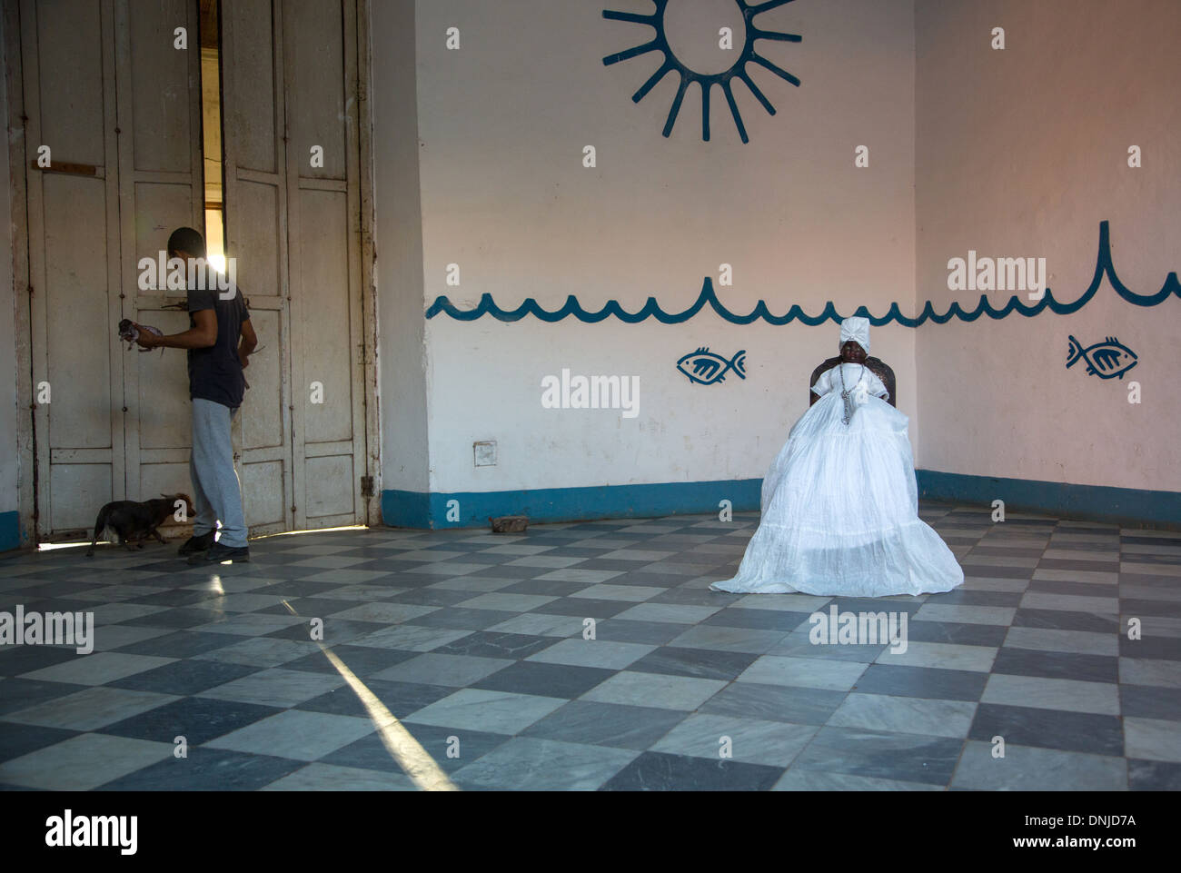 TRADITIONAL WHITE HABIT WORN BY THE NOVICES (IYAWOS) OF THE SANTERIA ...