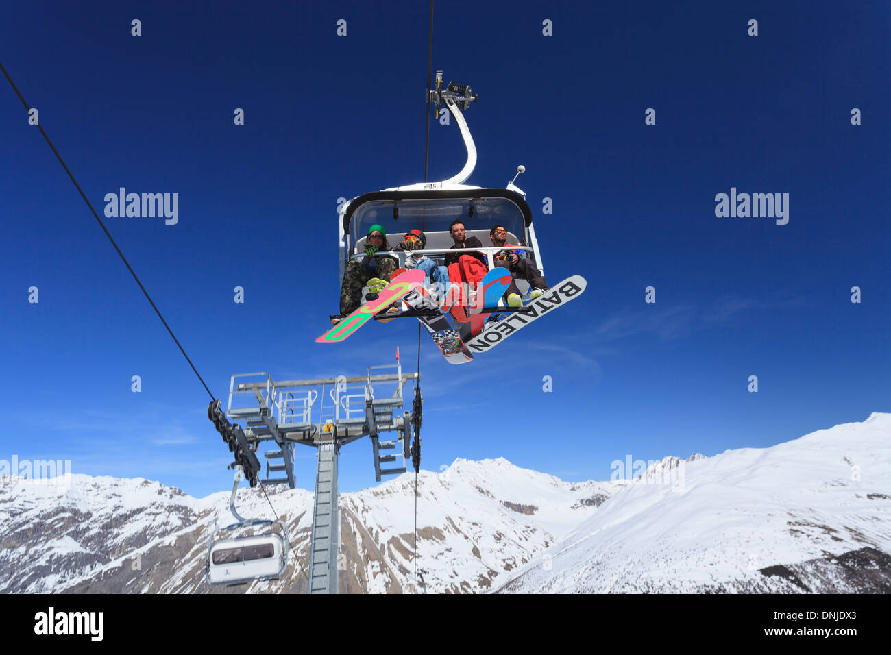 Ski and snowboarding action Stock Photo - Alamy