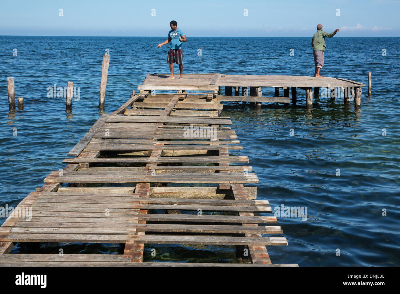 DILAPIDATED WOODEN PONTOON IN PUERTO ESPERANZA, SMALL FISHING PORT ...