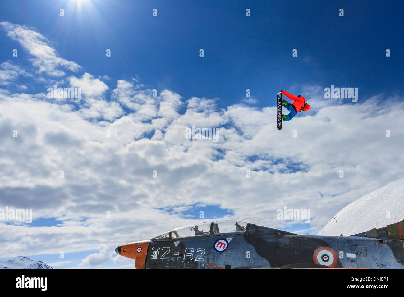 Ski and snowboarding action Stock Photo - Alamy
