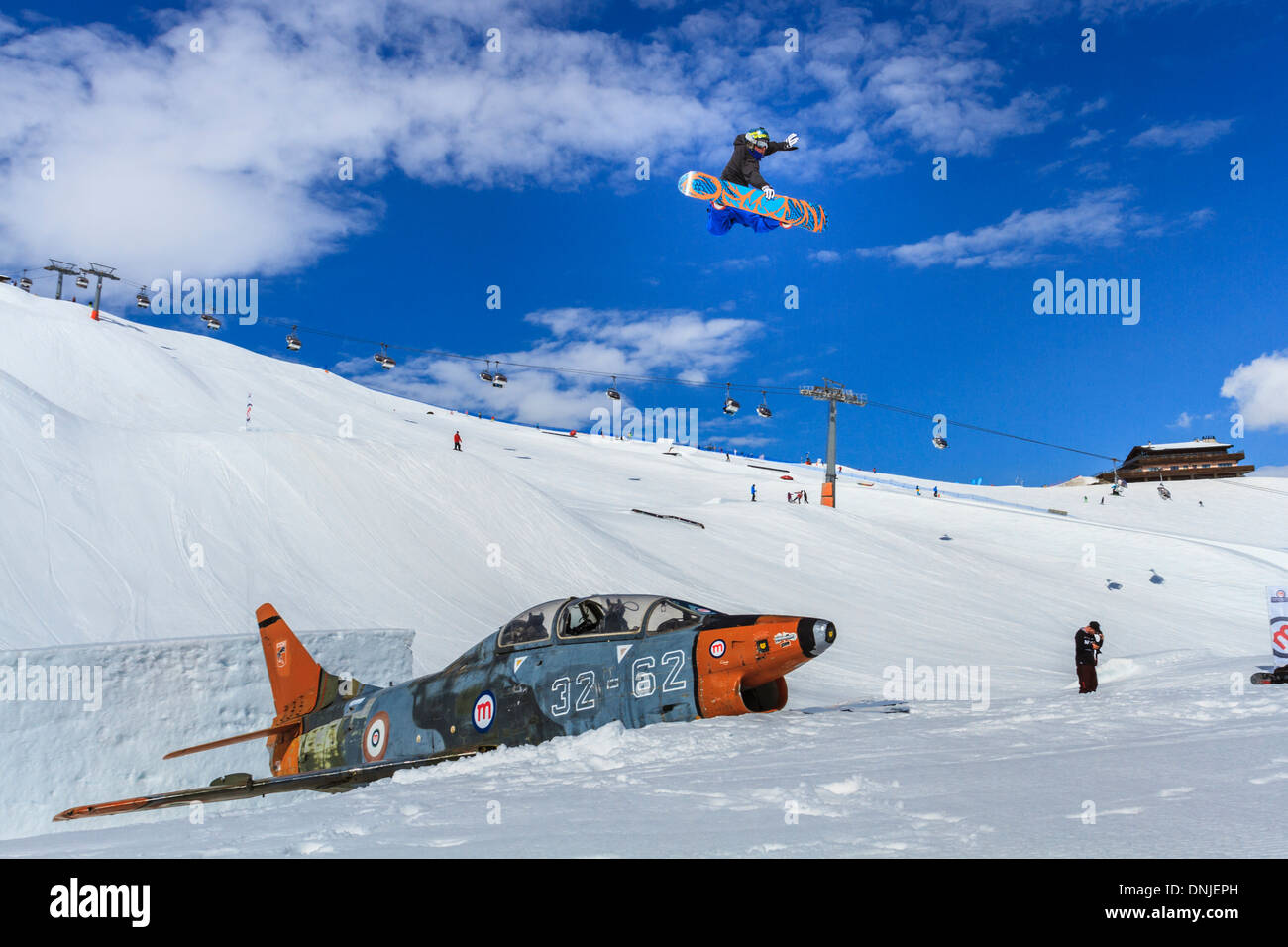 Ski and snowboarding action Stock Photo - Alamy