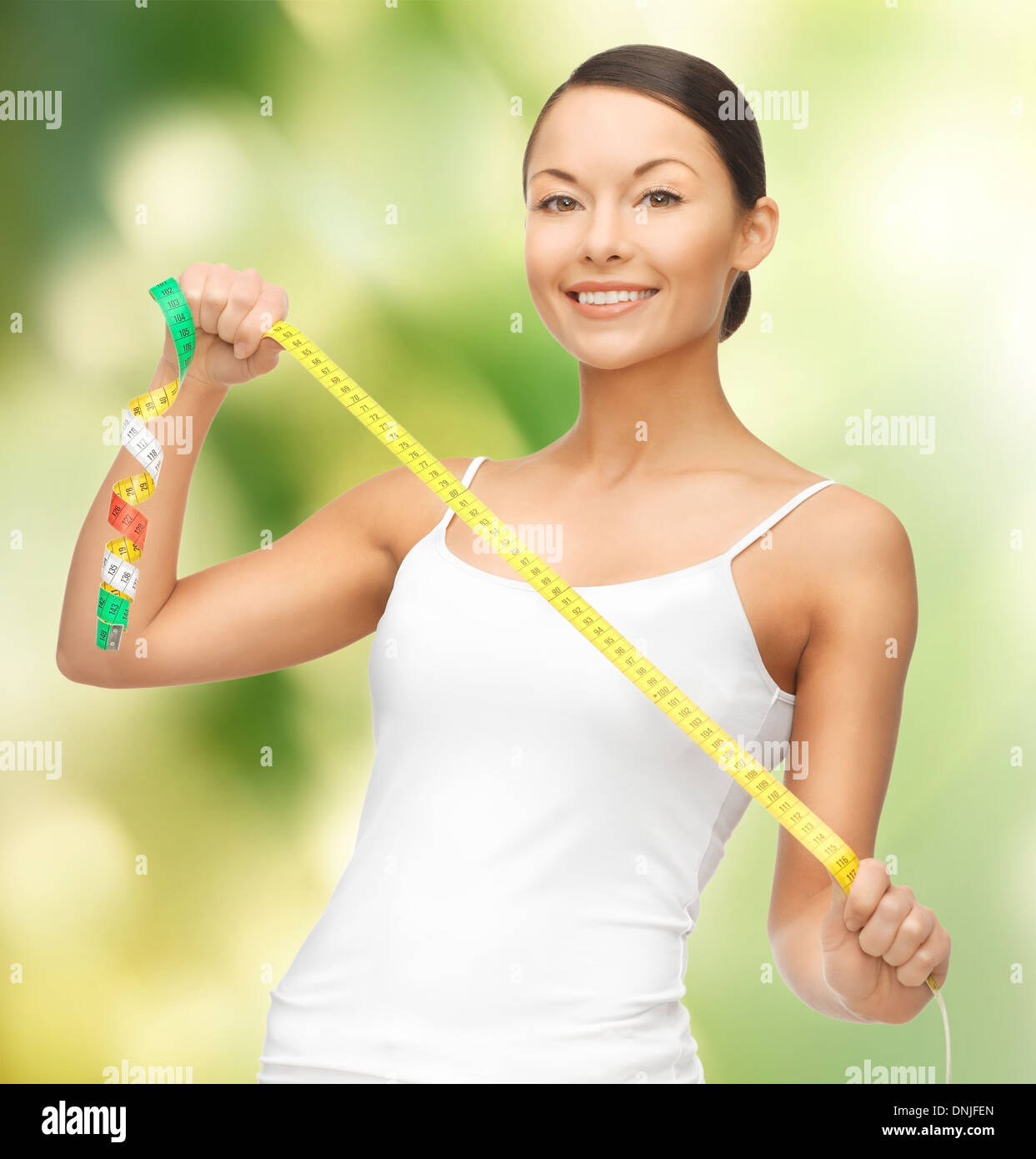 woman measuring her hips Stock Photo - Alamy