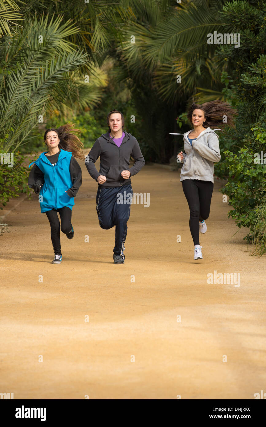 Three friends jogging in hi-res stock photography and images - Alamy