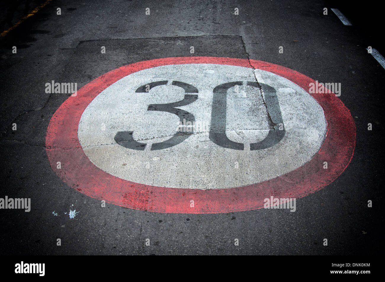 Sign for the speed limit on road Stock Photo - Alamy