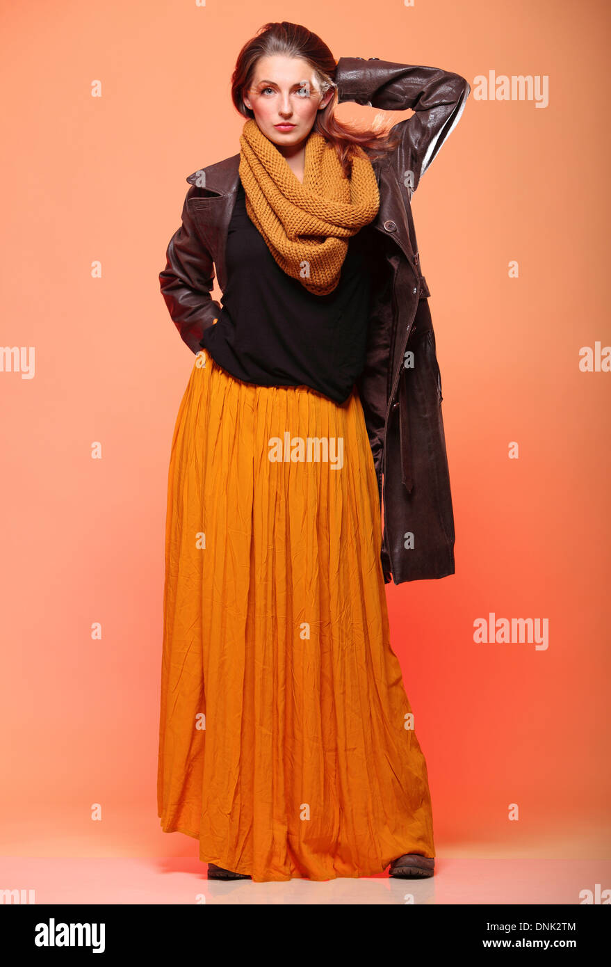 Fall. Fashion woman in autumn color fresh girl in full length long ...