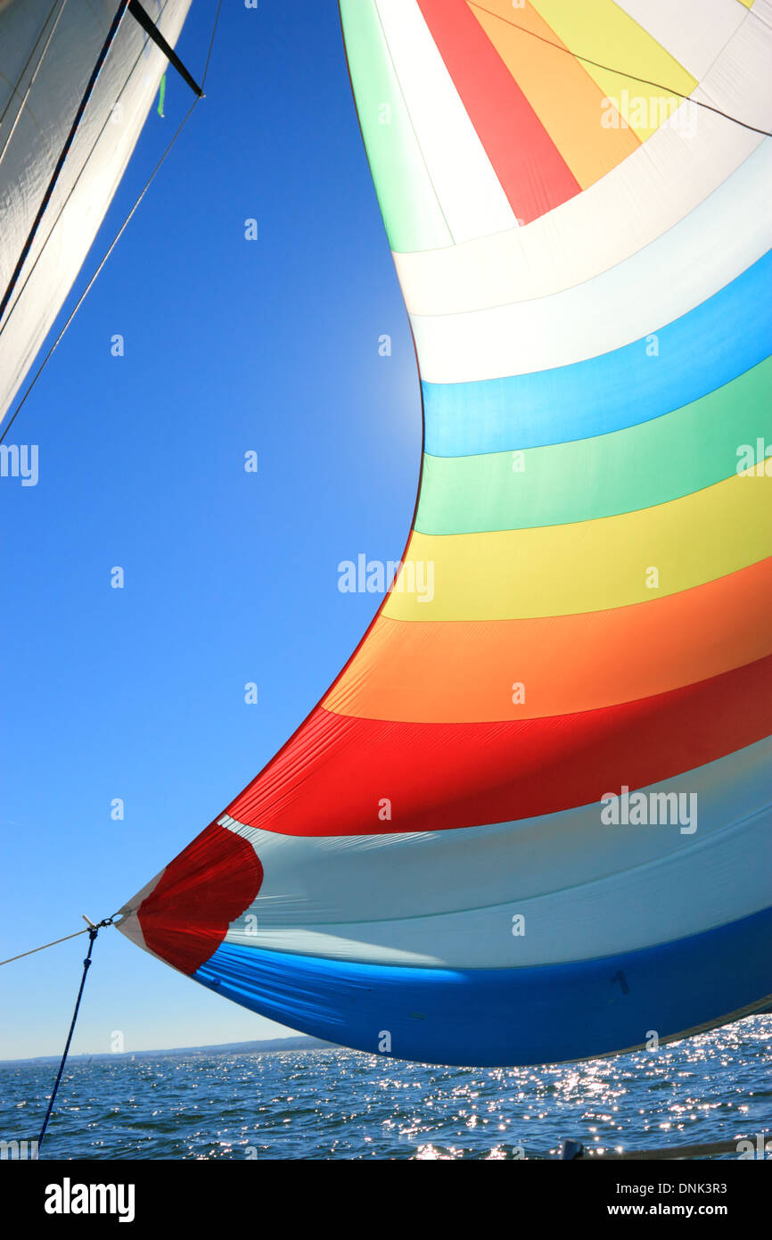 The wind has filled the spinnaker on sailing yacht. Detail of a ...