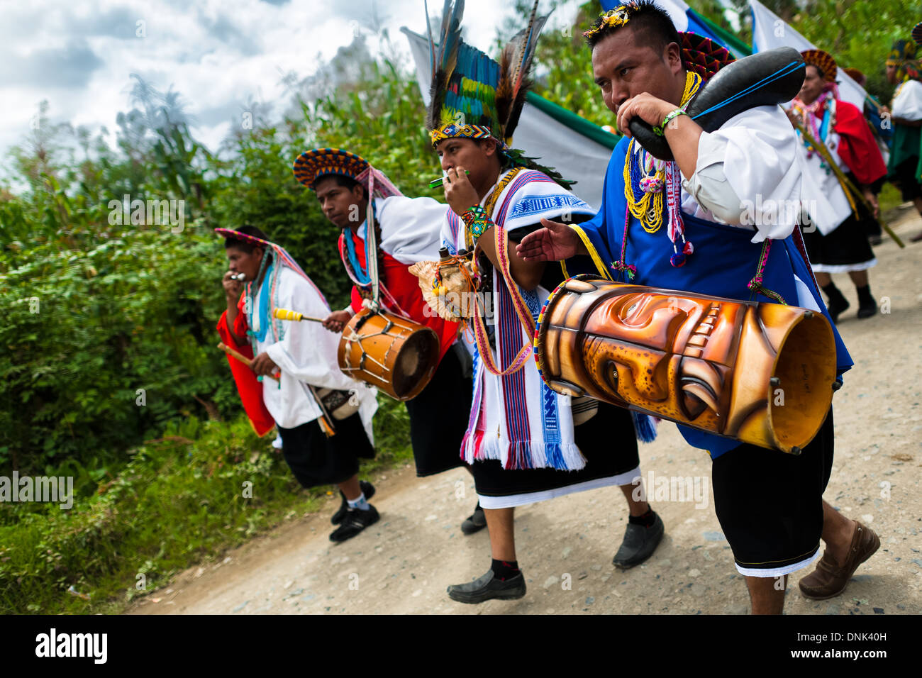 Natives from the Kamentsá tribe play drums and wind instruments during ...