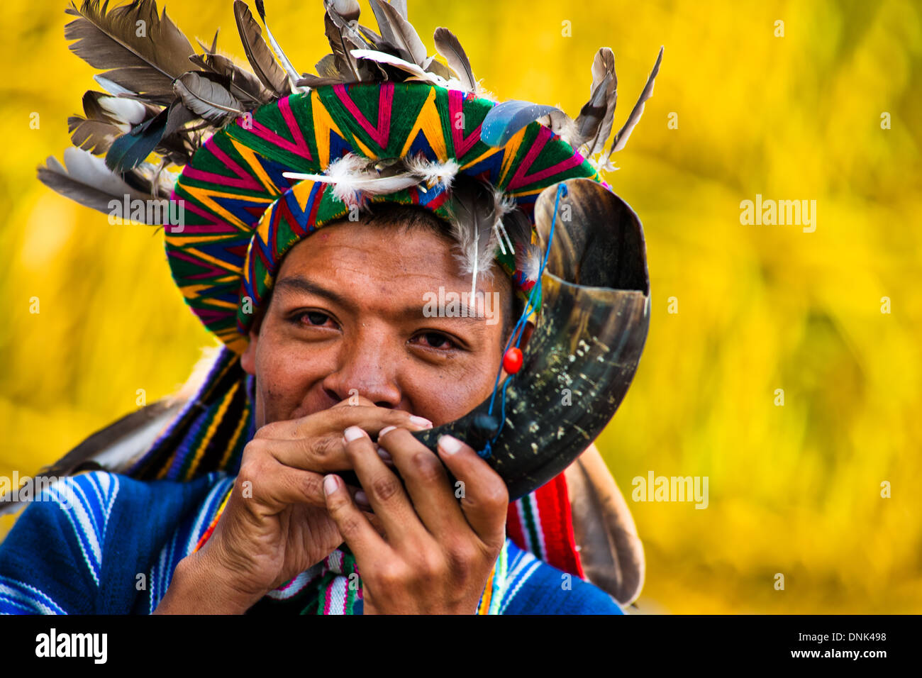A native from the Kamentsá tribe plays horn trumpet during the Carnival ...