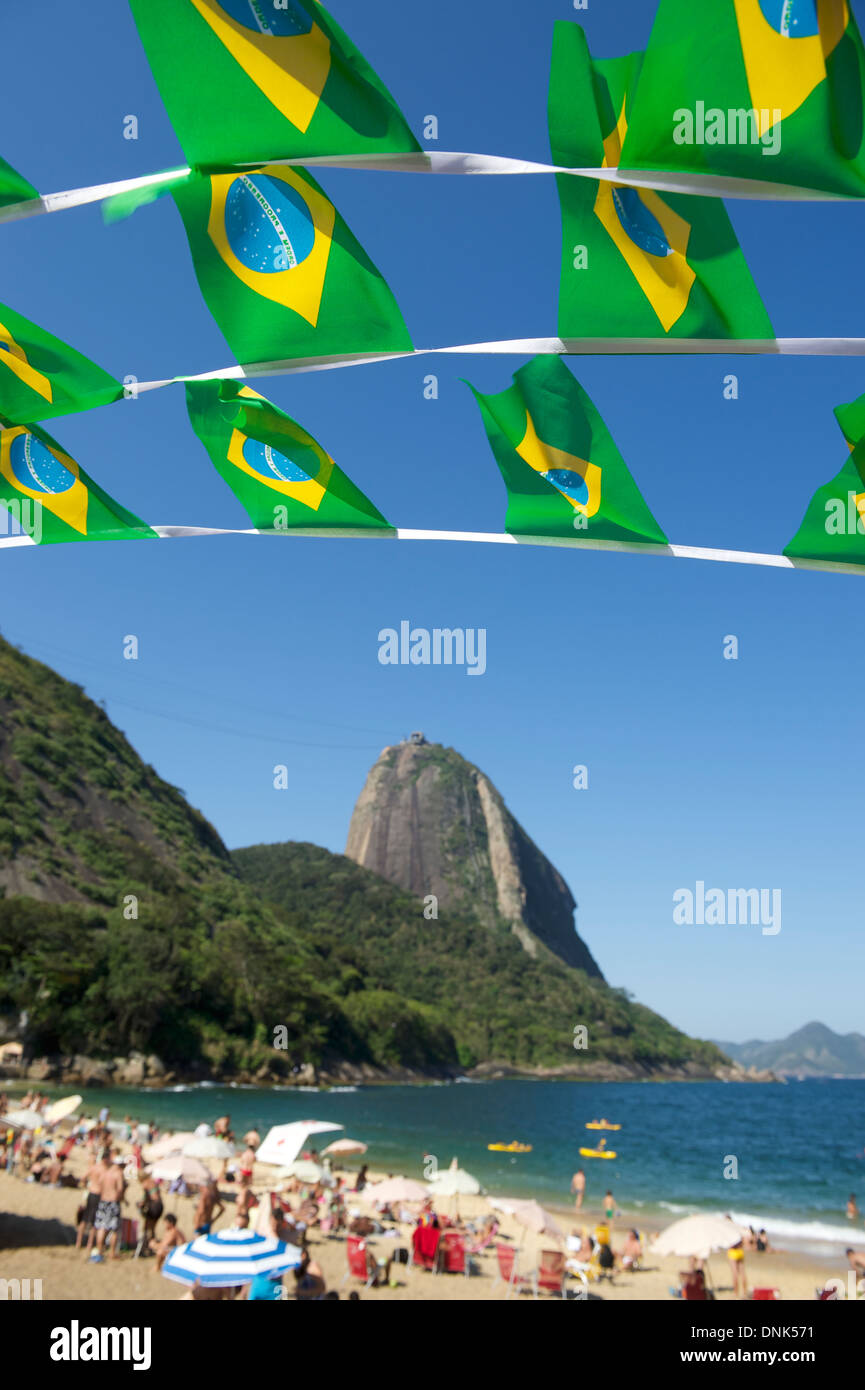 Brazilian flag bunting at Praia Vermelha Red Beach at Sugarloaf ...