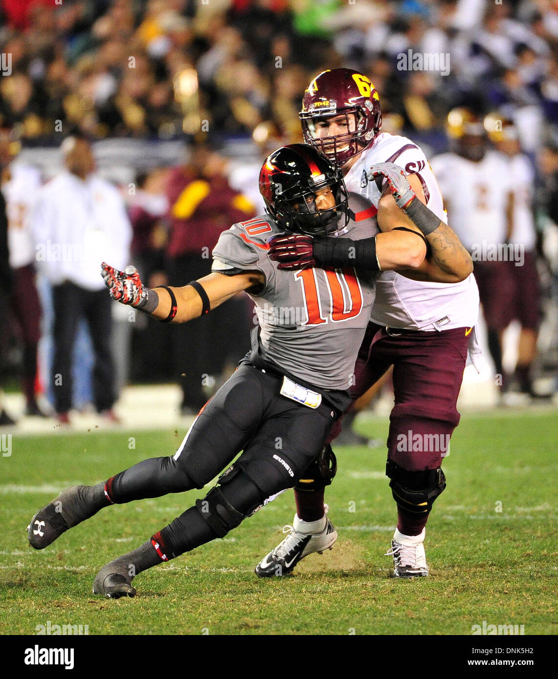 San Diego, CA, . 30th Dec, 2013. Pete Robertson #10 of the Red Raiders ...