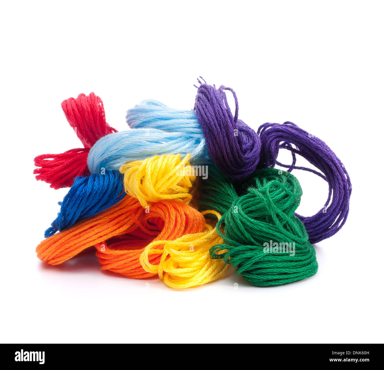 Color threads bunch isolated on white background cutout Stock Photo - Alamy