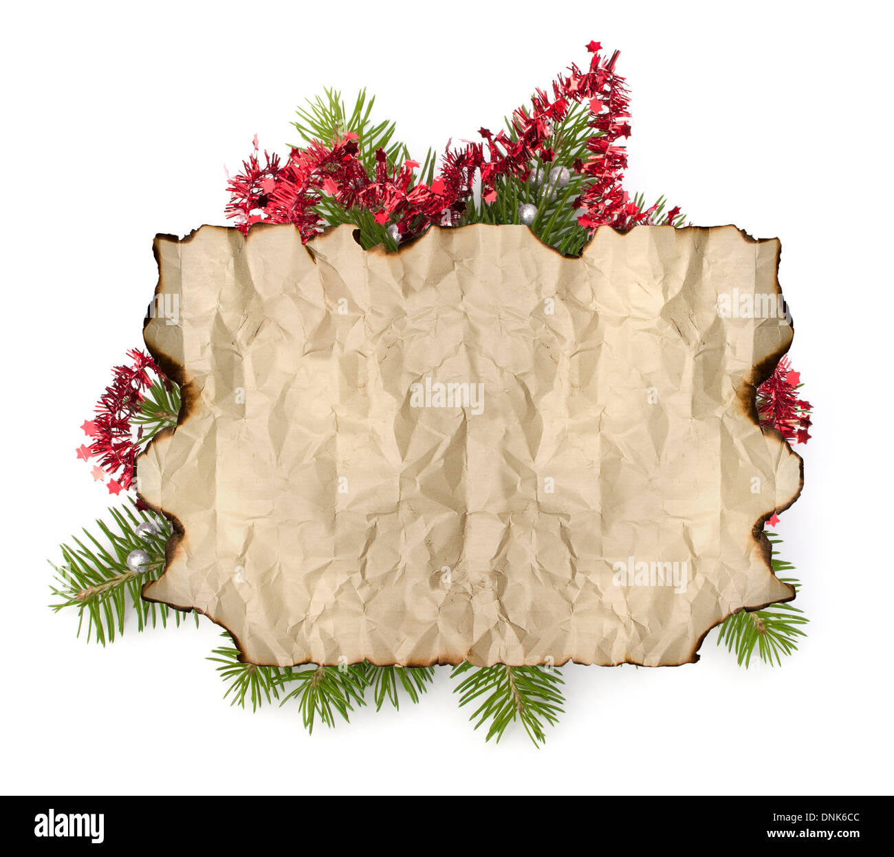 Old parchment paper with copy space on Christmas tree branch background ...