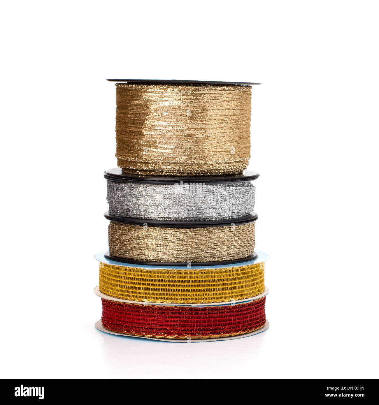 Festive ribbons stack isolated on white background Stock Photo - Alamy