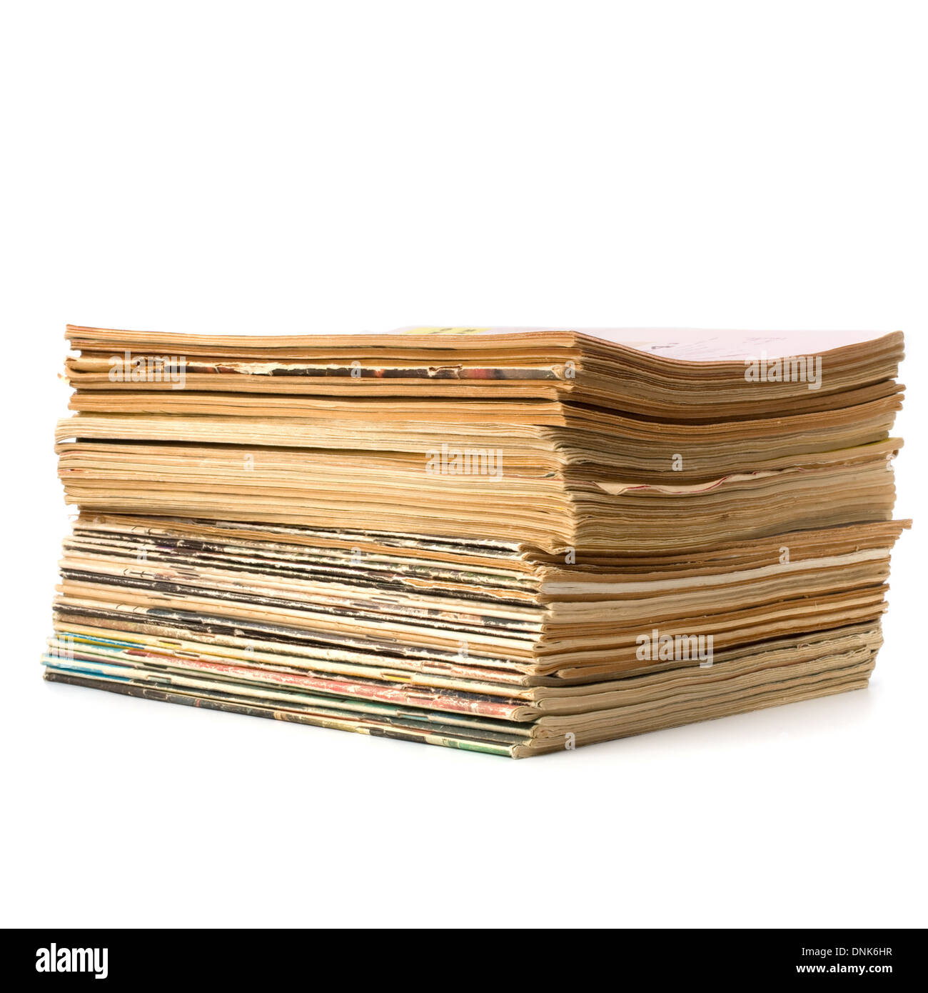 tattered journals stack isolated on white background Stock Photo - Alamy