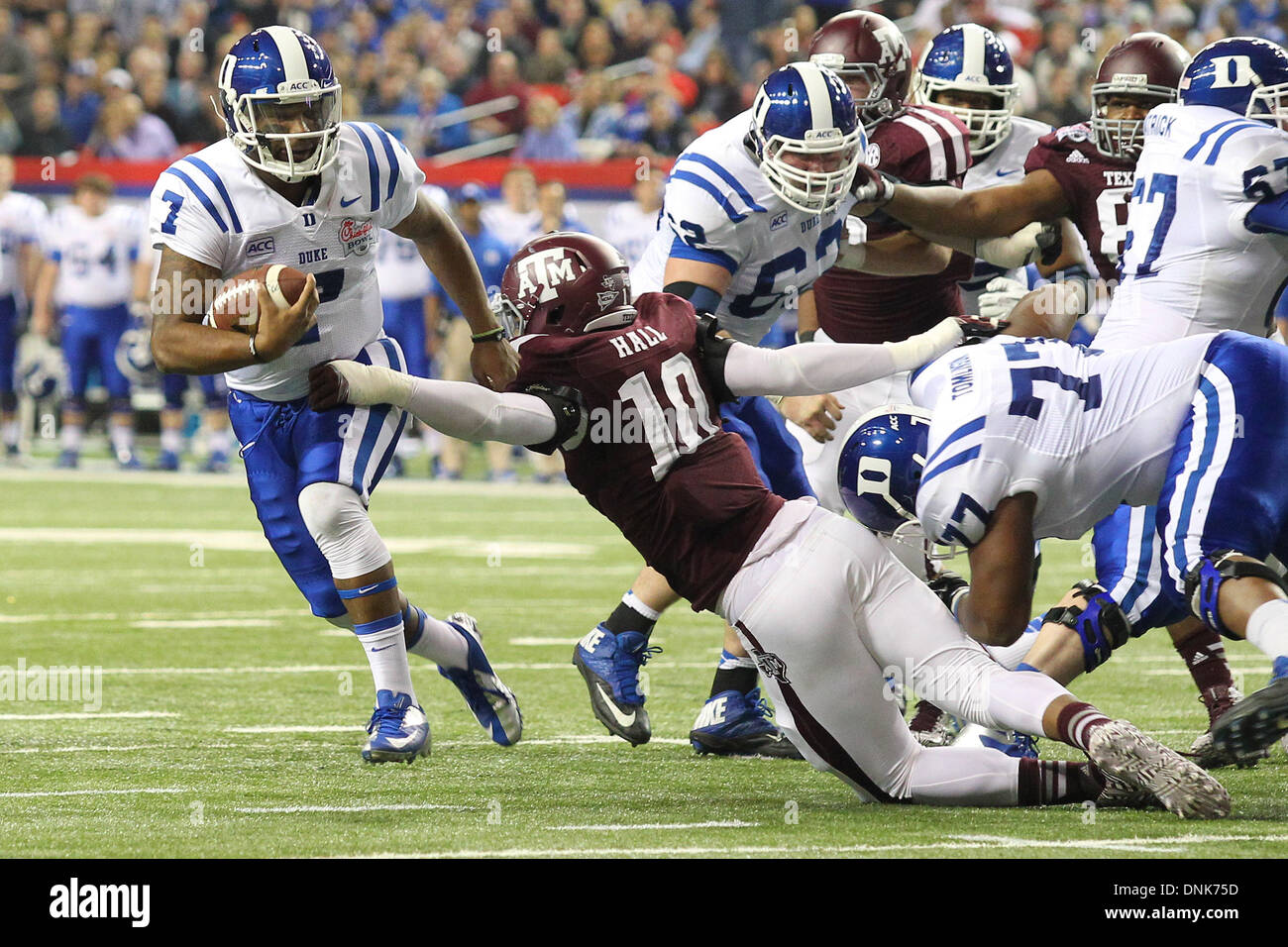 Atlanta, Georgia, USA. 31st December 2013. Duke's Anthony Boone (7 ...