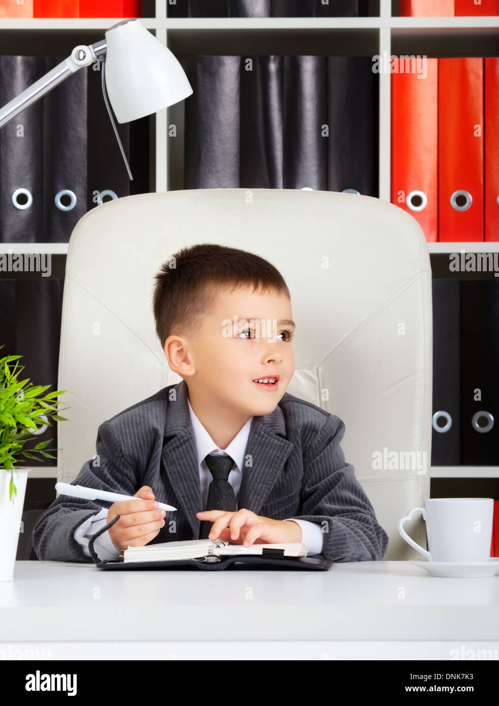Boy in office hi-res stock photography and images - Alamy