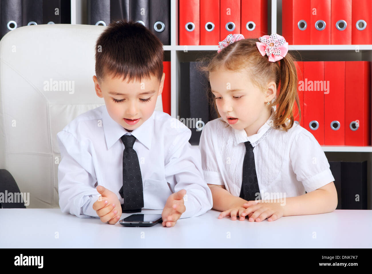 little children as a businessmen, in office Stock Photo - Alamy