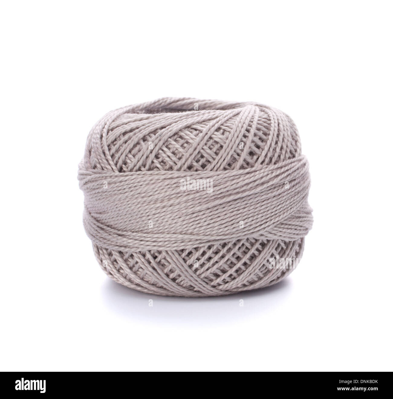spool of grey thread isolated on white background Stock Photo - Alamy