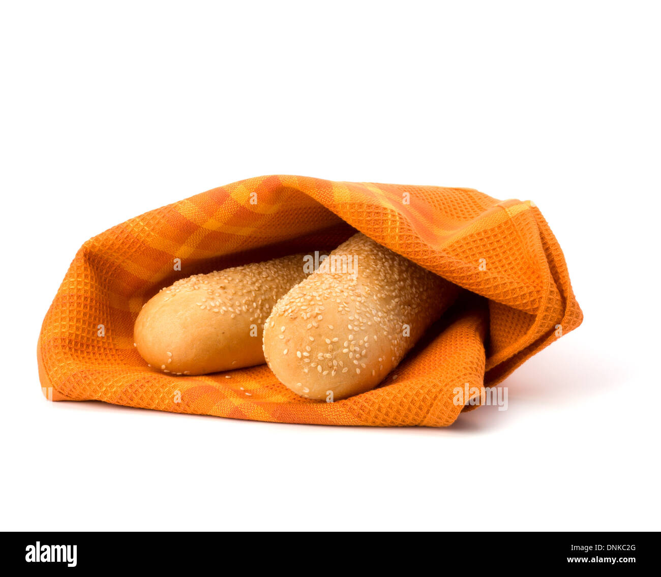 Fresh warm bread over kitchen towel isolated on white background Stock ...