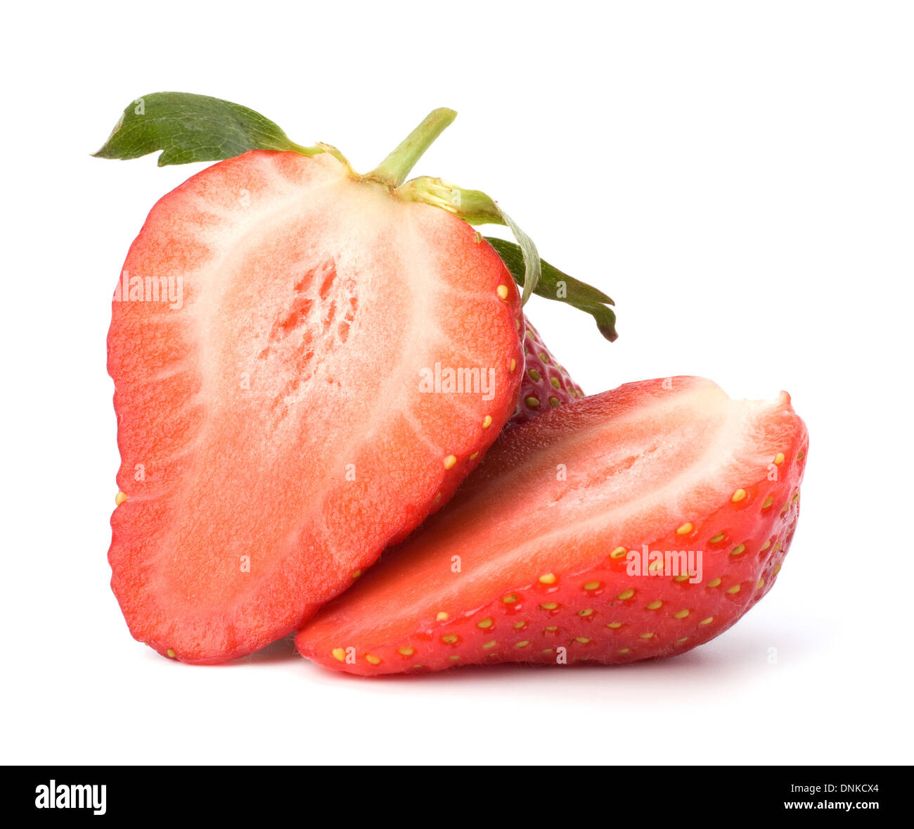 Halved strawberries isolated on white background Stock Photo - Alamy