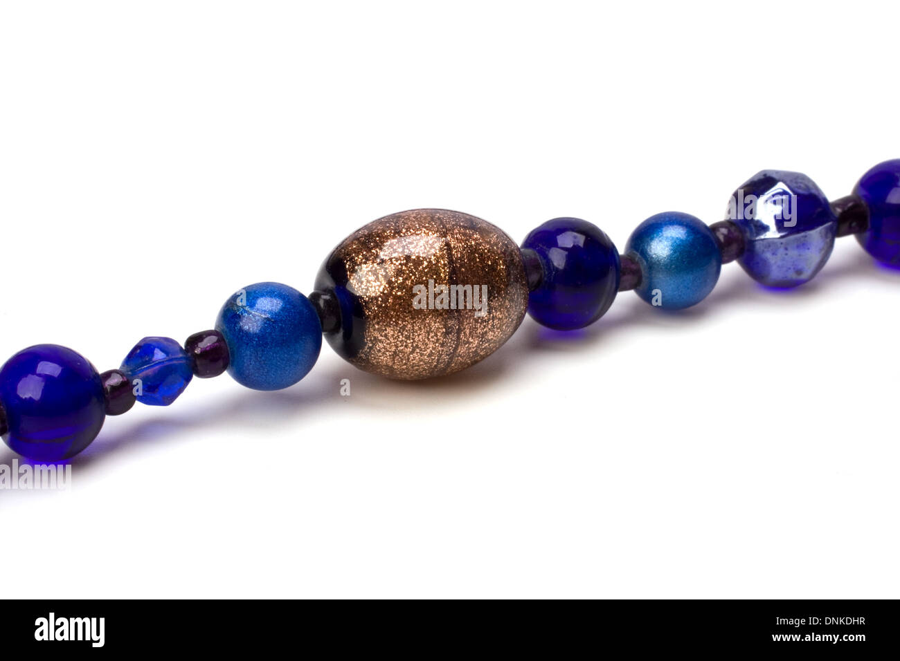 blue beads isolated on white background Stock Photo - Alamy