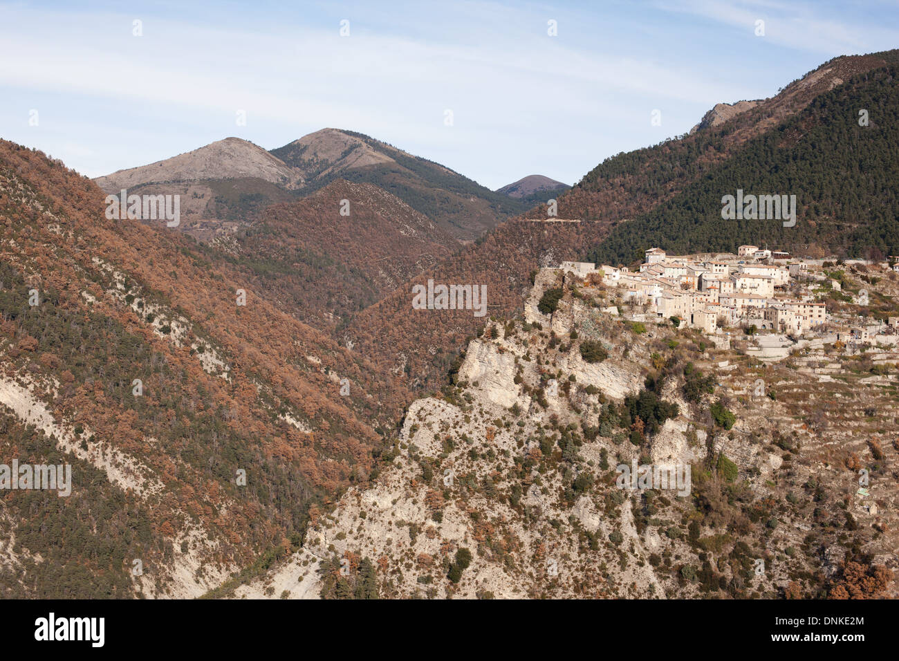 AERIAL VIEW. Perched medieval village high above an unpopulated valley ...