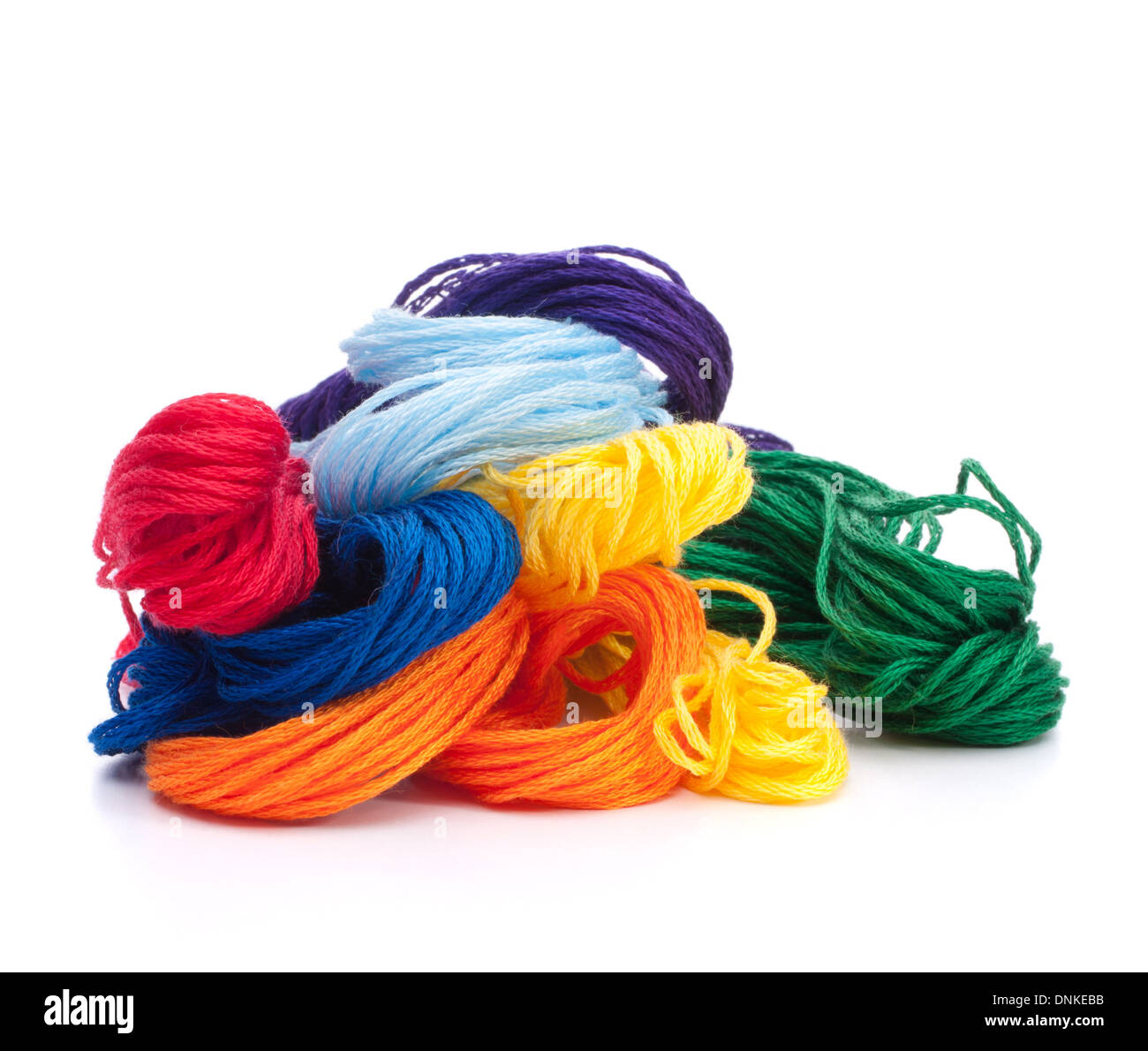 Color threads bunch isolated on white background cutout Stock Photo - Alamy