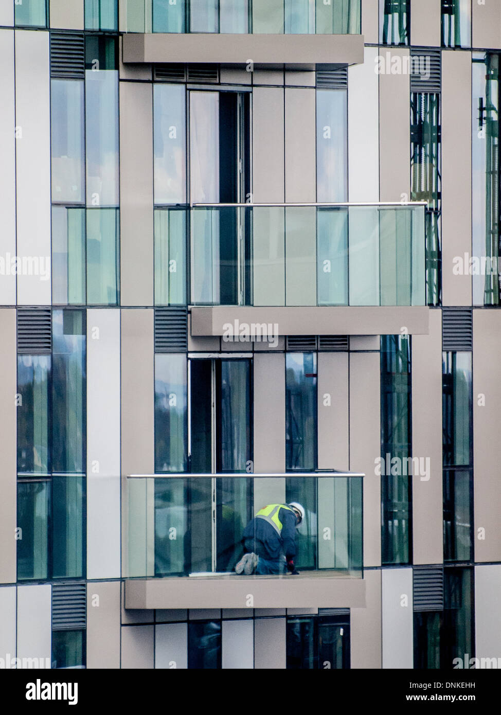 A workman on the Saffron Square development in central Croydon, London ...