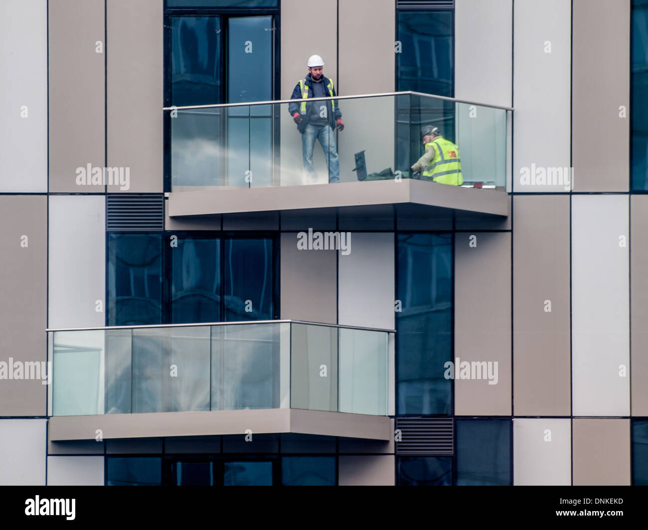 Workmen on the Saffron Square development in central Croydon, London ...
